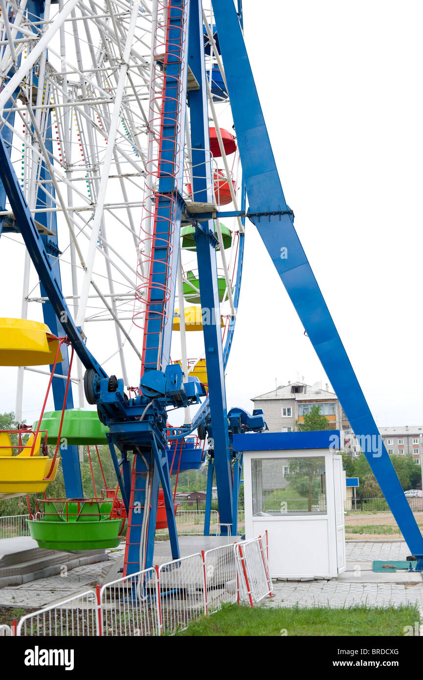 lower part of Ferris wheel with an operator booth beside Stock Photo ...