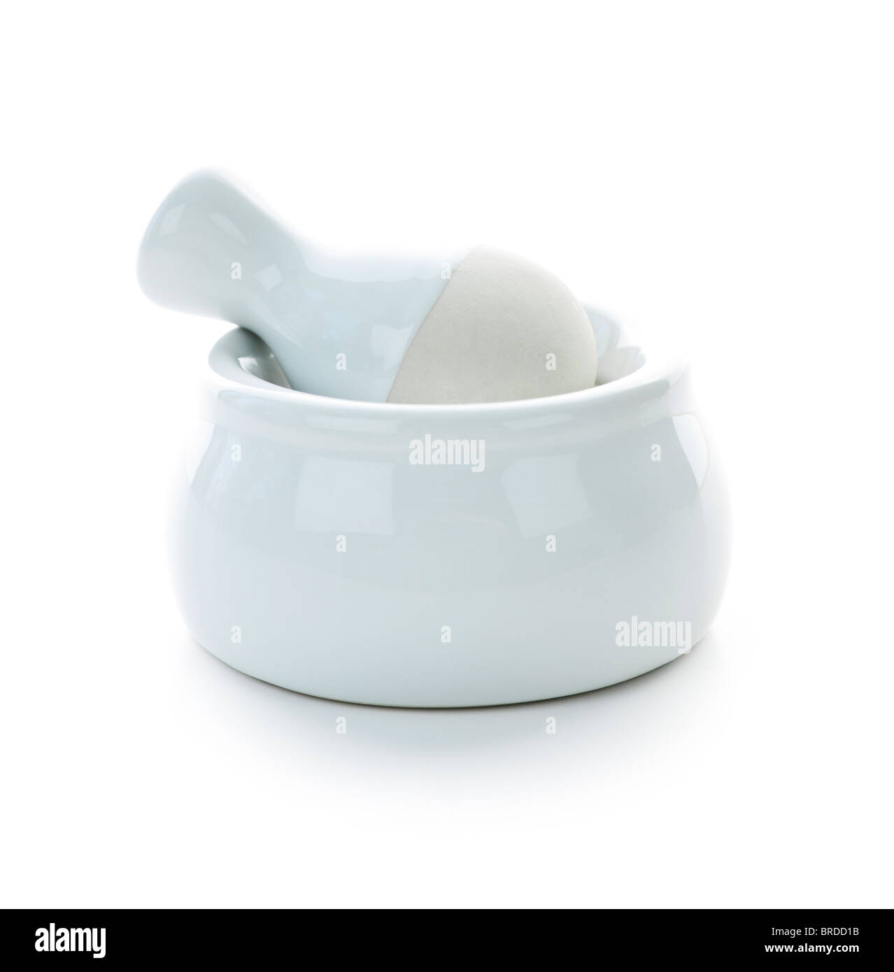White ceramic mortar and pestle isolated on white background Stock ...
