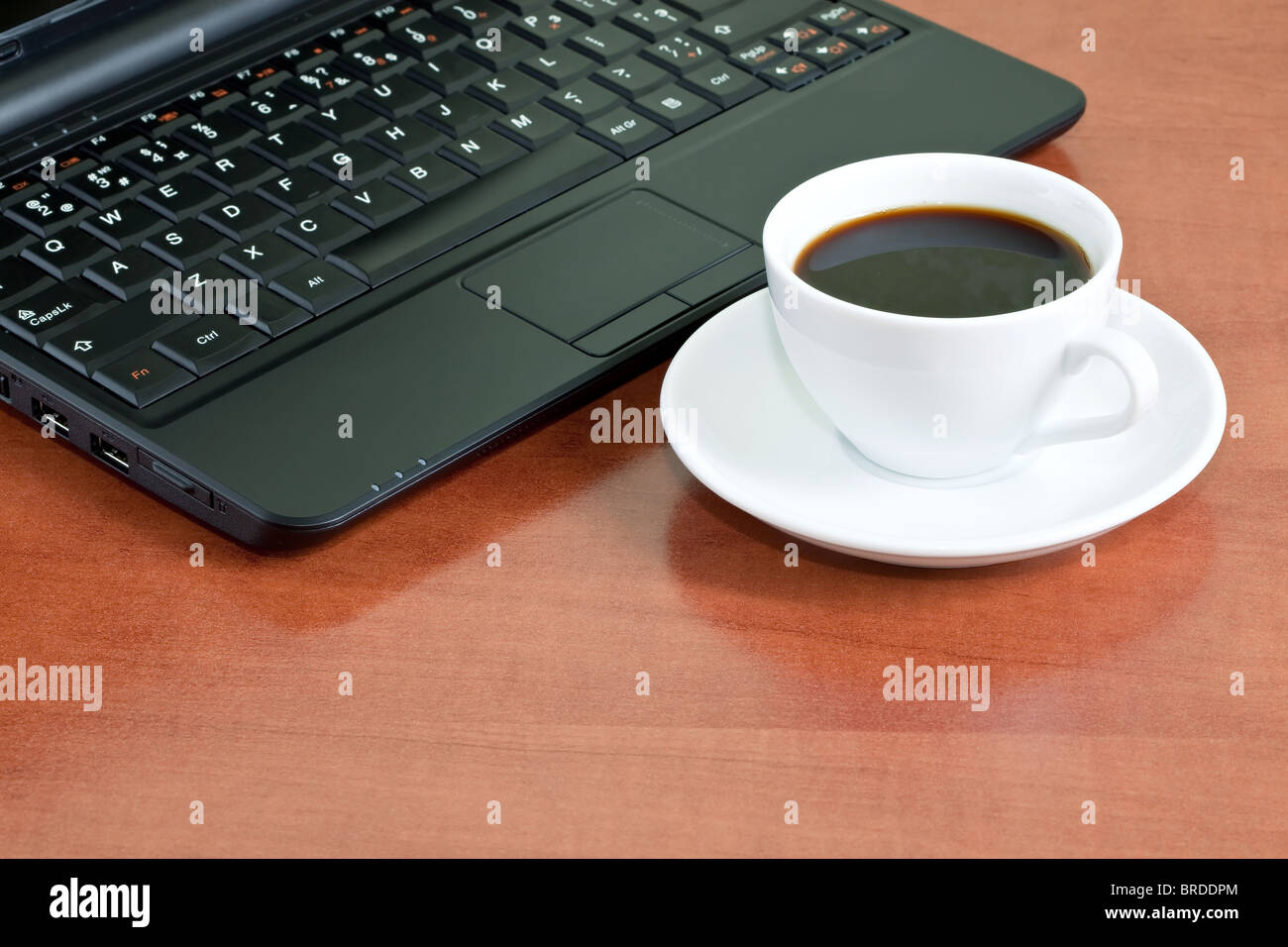 Laptop and coffee on the desk Stock Photo - Alamy