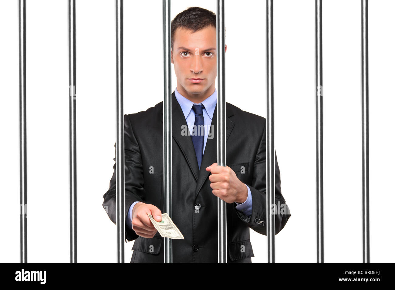 A businessman in jail giving bribe Stock Photo - Alamy