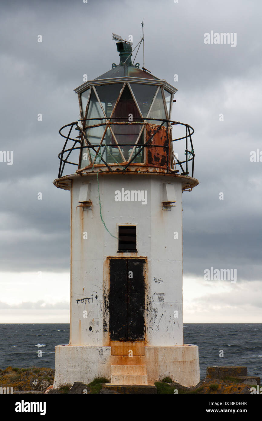 A rugged lighthouse on the coast of Scotland Stock Photo - Alamy