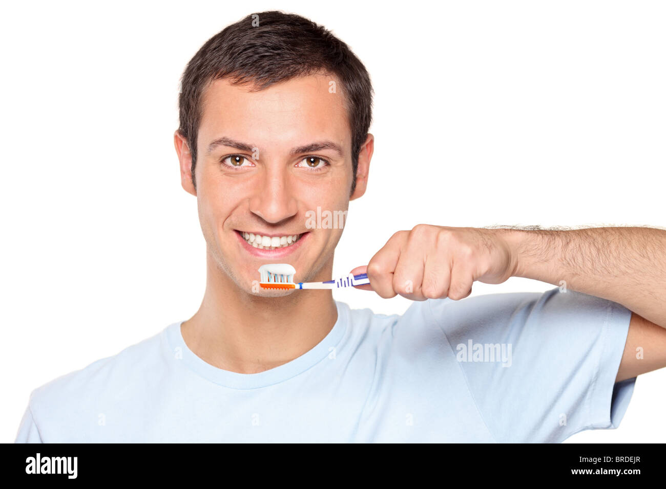 A young man brushing his teeth Stock Photo - Alamy