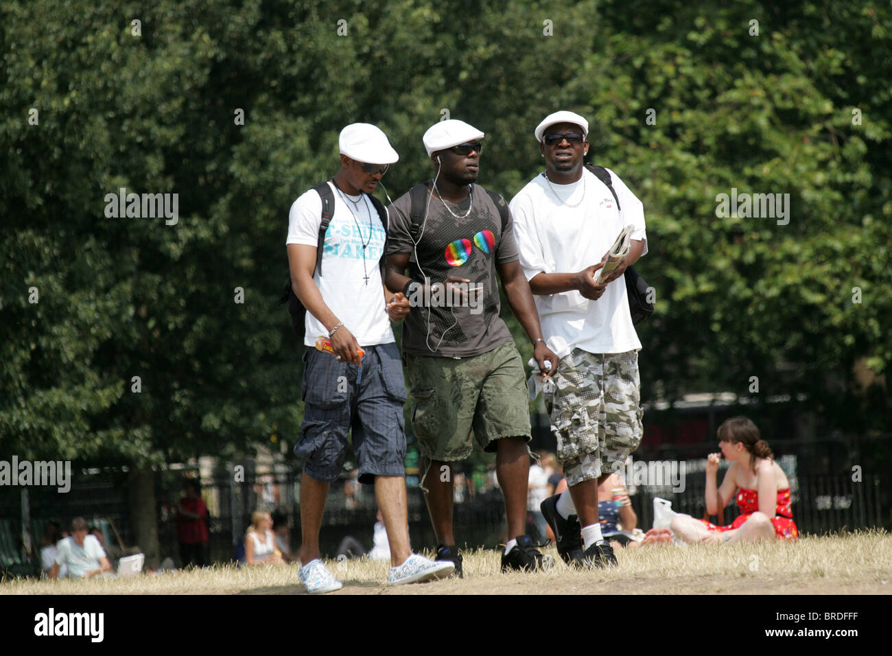 Three Cool Dudes in Hyde Park, London, UK; 02.07.2009 Stock Photo - Alamy