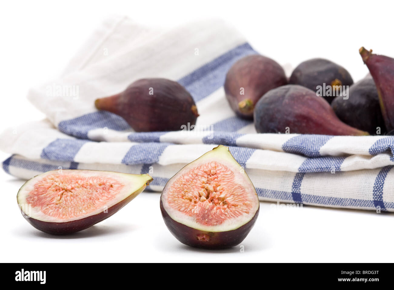 Closeup of delicious organic figs whole and half Stock Photo - Alamy