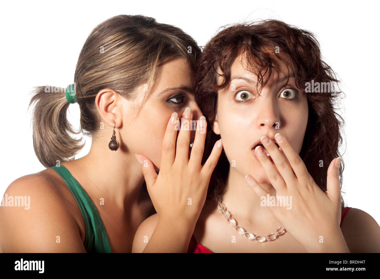 Telling a secret hi-res stock photography and images - Alamy
