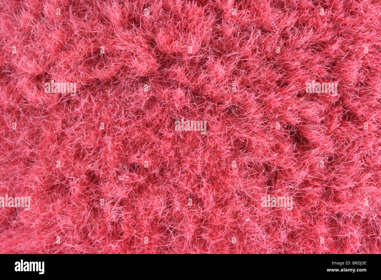Close up view of hairy red fabric texture - fur like clothing Stock ...