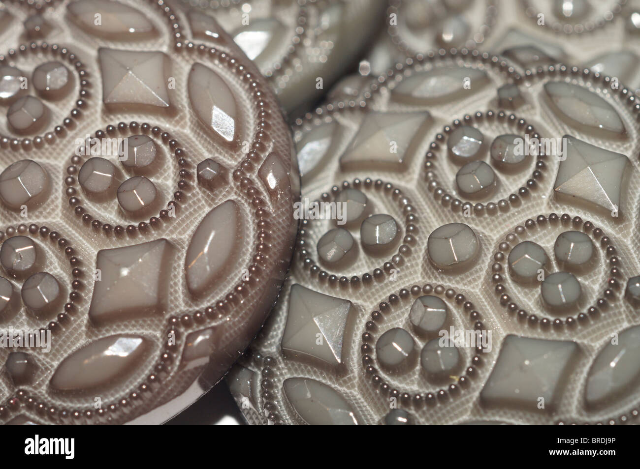 Gray buttons closeup Stock Photo - Alamy