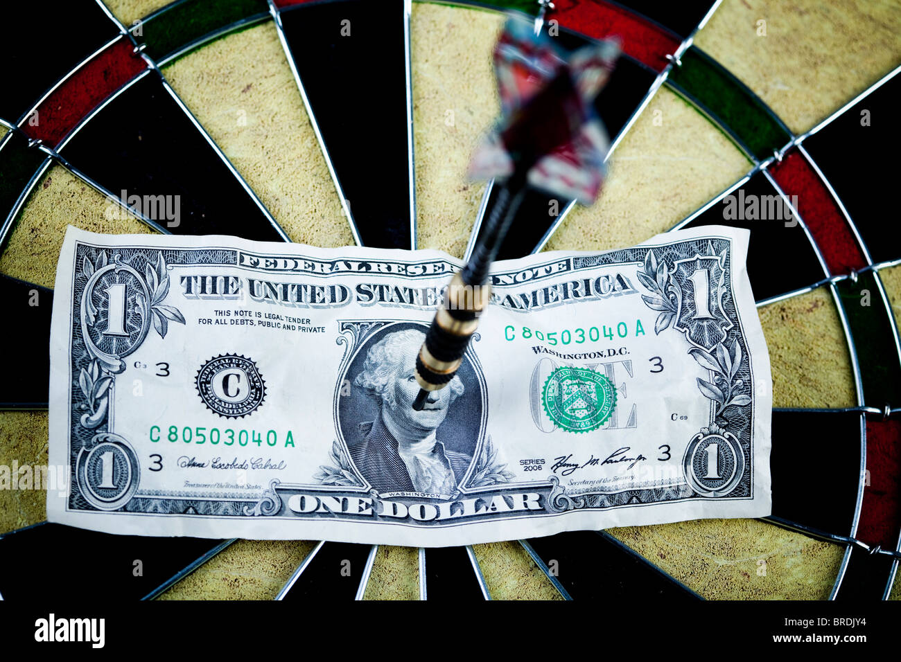 Target board with money Stock Photo - Alamy