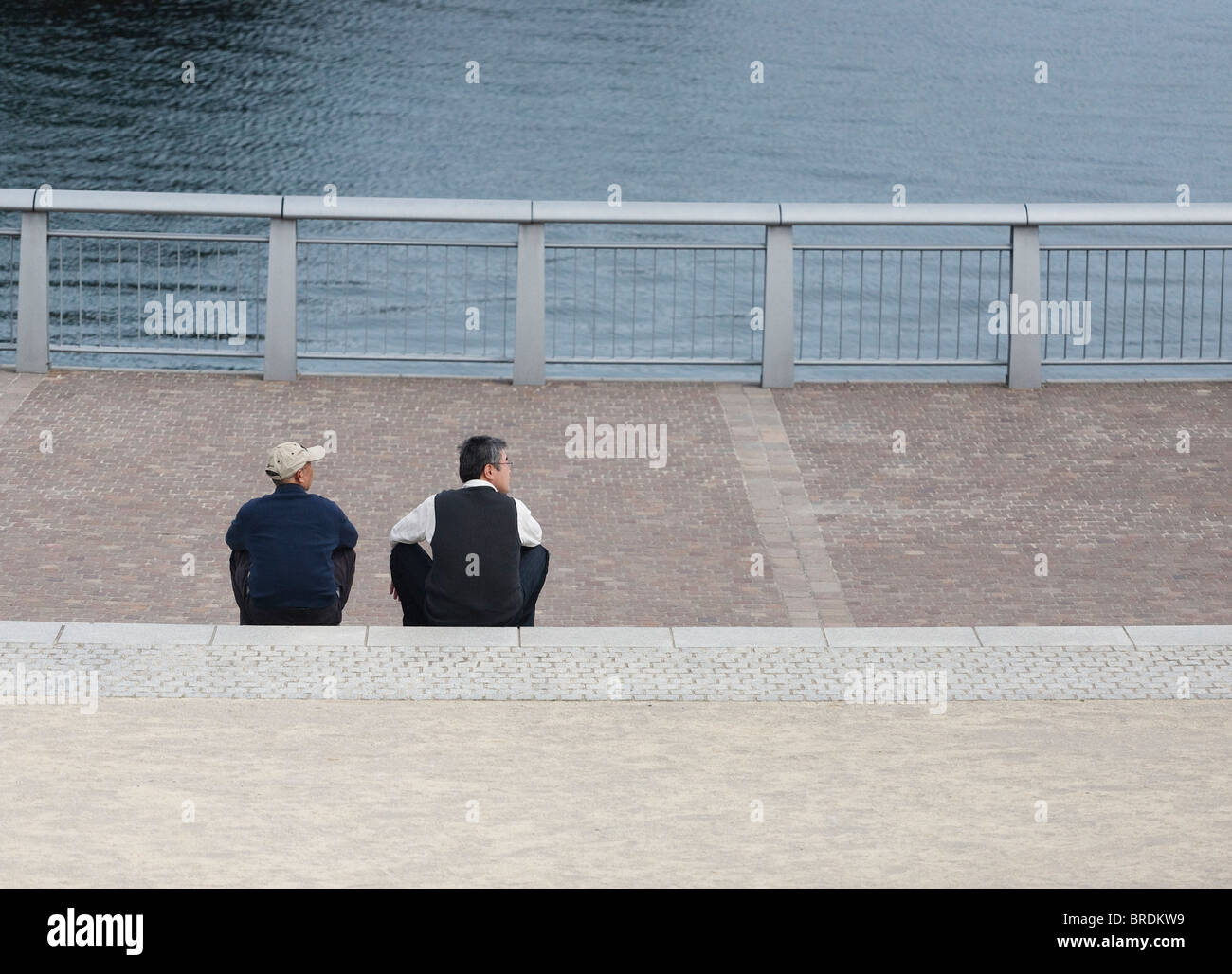 Men on a bridge Stock Photo - Alamy
