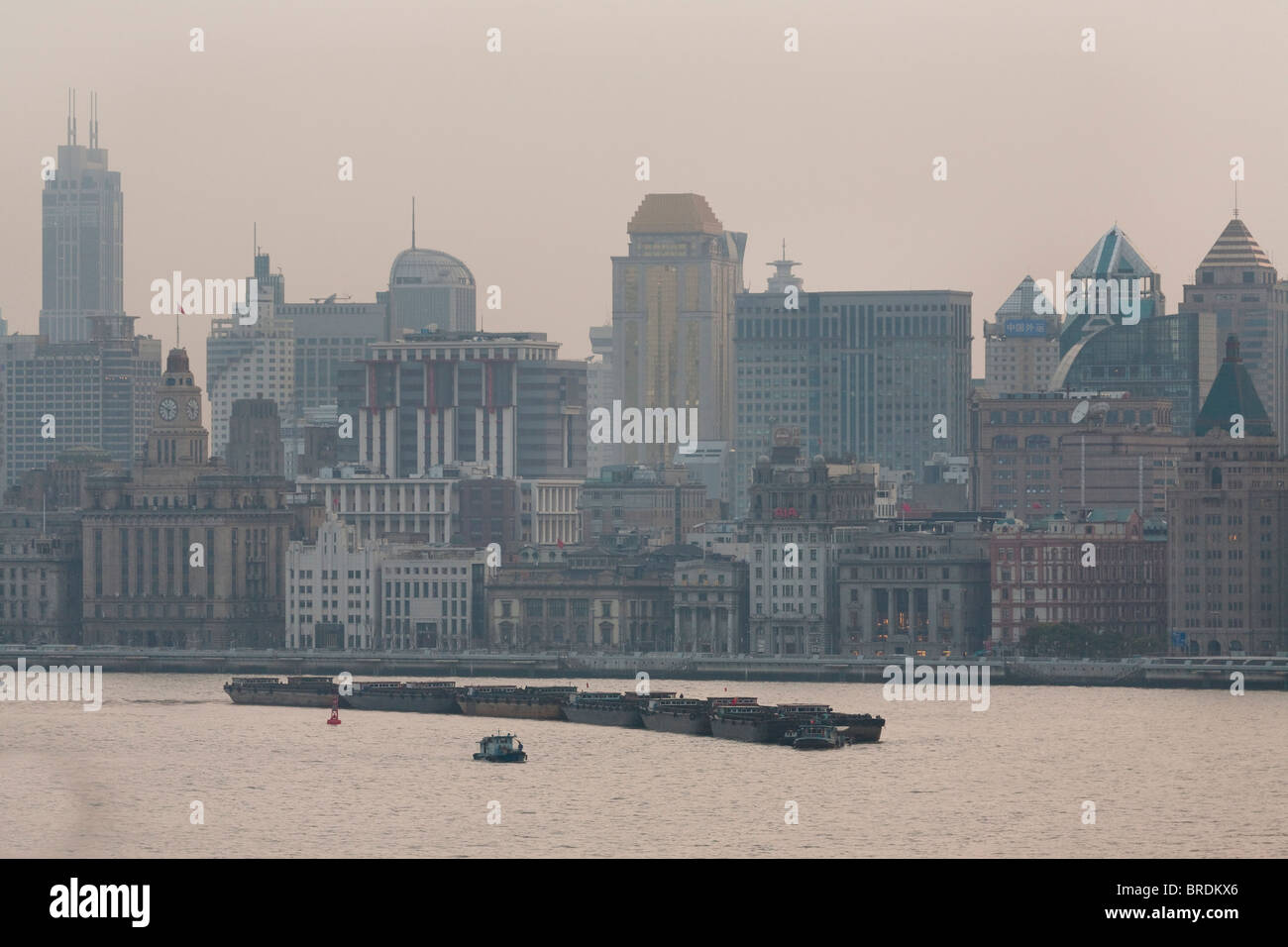 Shanghai the Bund from the river. Barges on the river Stock Photo - Alamy