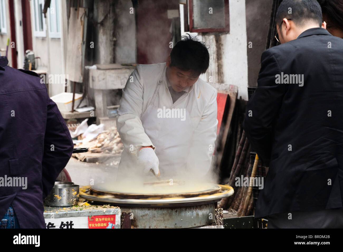 Street cooking in Shanghai China Stock Photo - Alamy