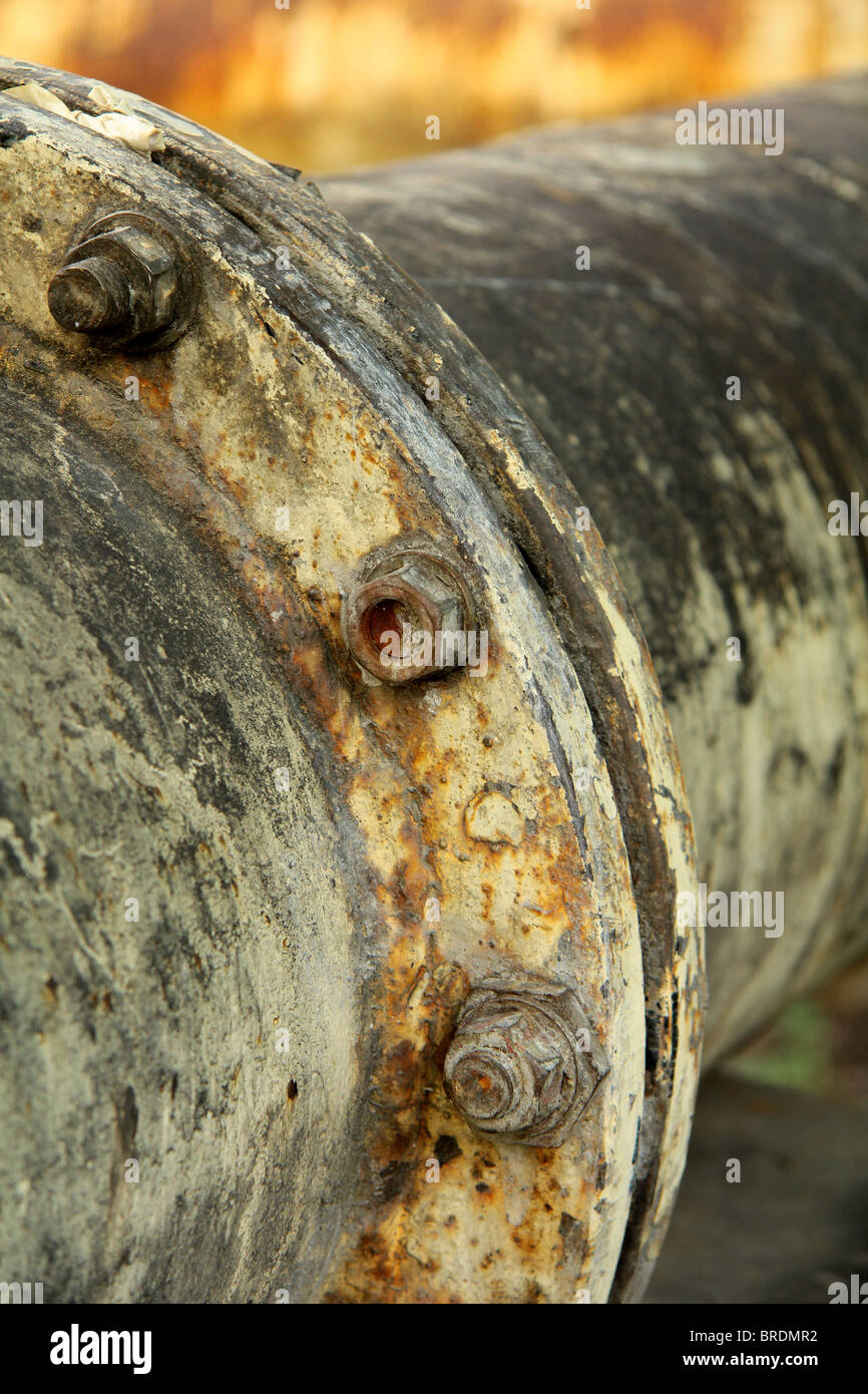 Big old iron pipe with bolts Stock Photo - Alamy