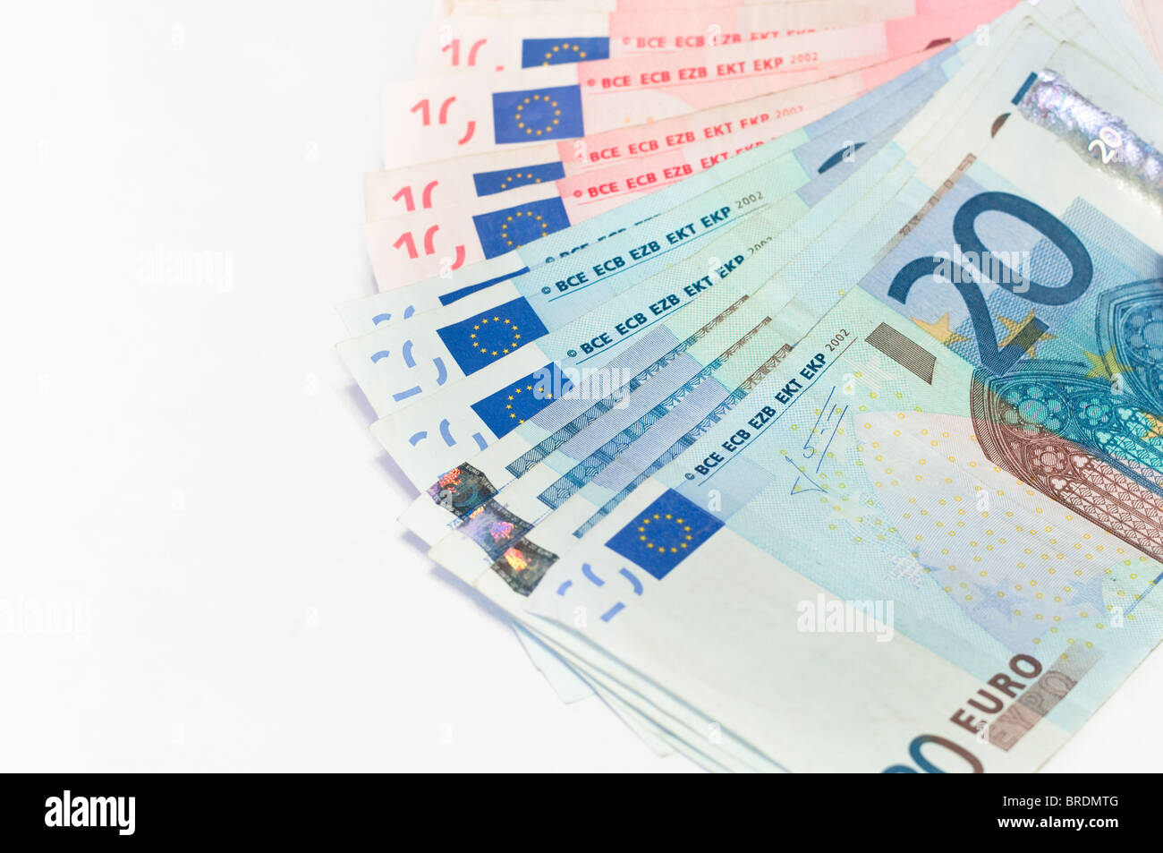Euro cash fan-shaped on white background. Copy space Stock Photo - Alamy