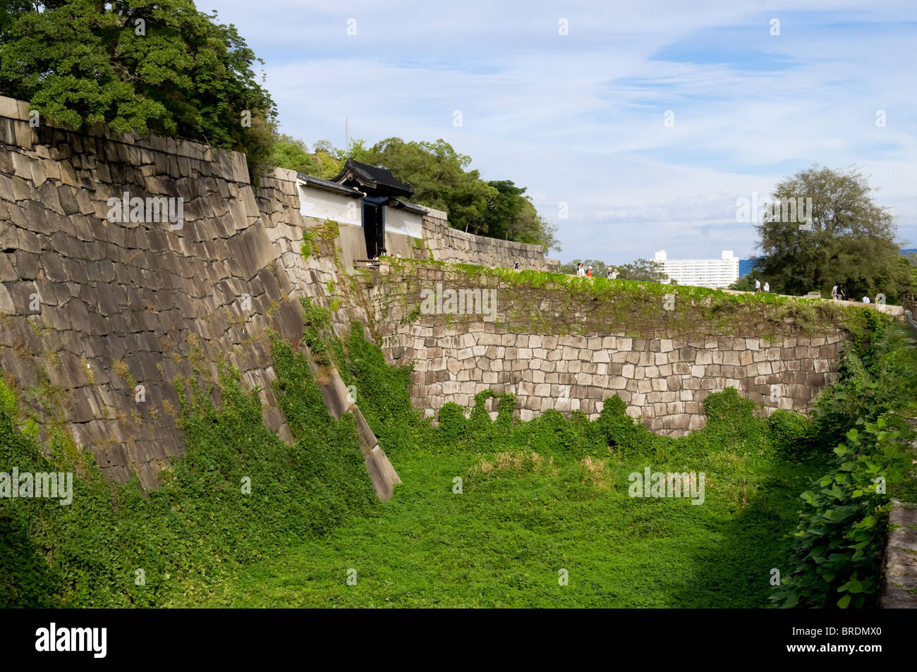Moat and main bridge into Osaka Castle Stock Photo - Alamy