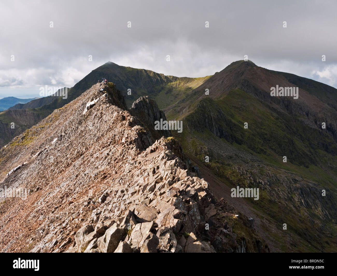 The arete of Crib Goch, a famous ridge traverse in Snowdonia forming ...