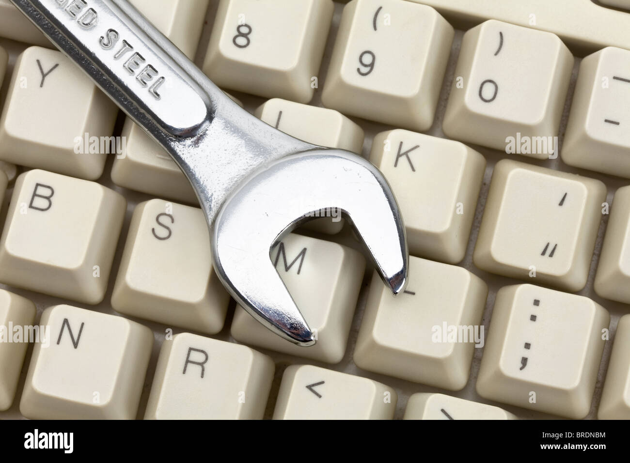 Computer Keyboard and Wrench, concept of IT Support Stock Photo - Alamy