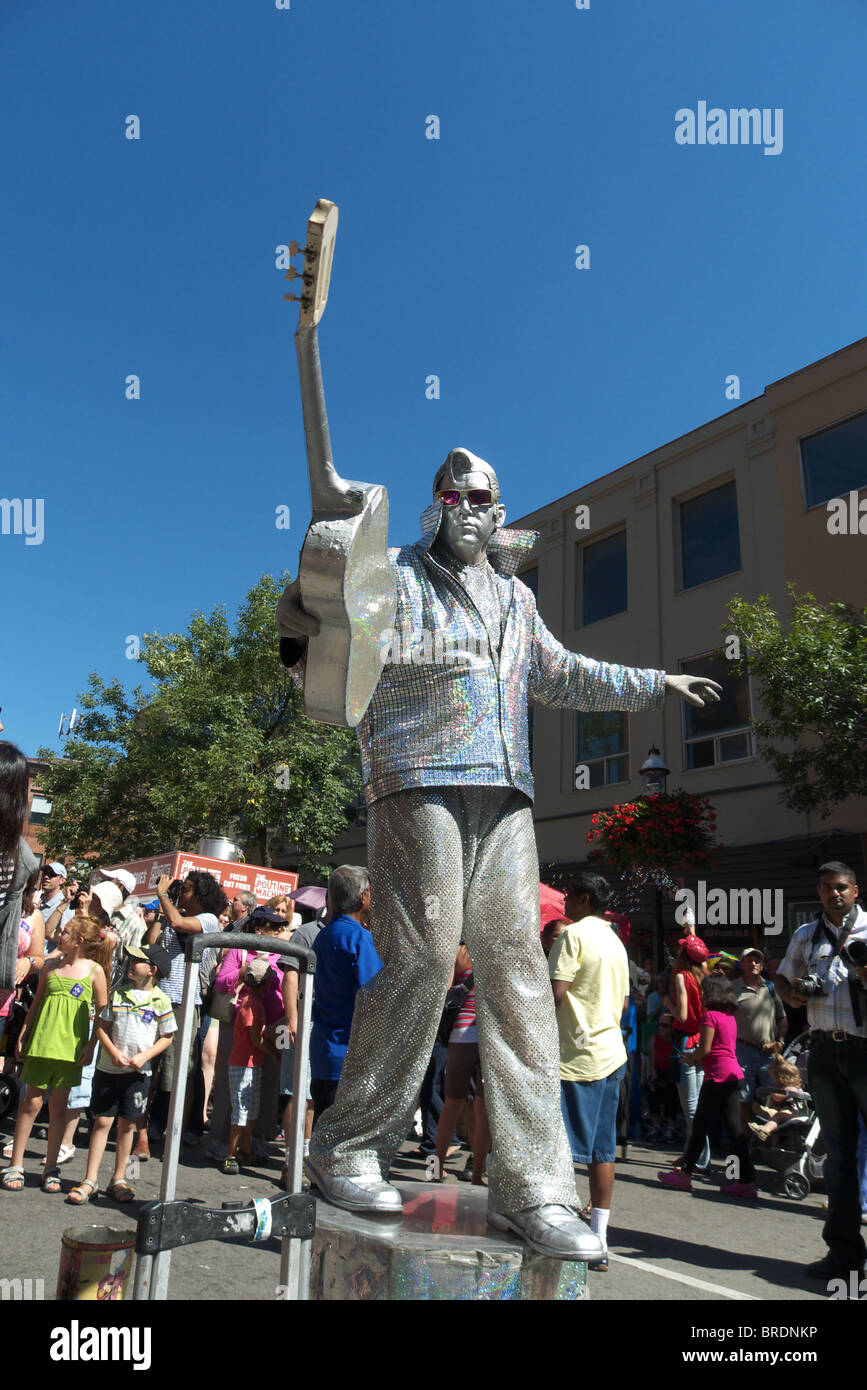 A strange and bizarre Elvis impersonator performs at the 2010 ...