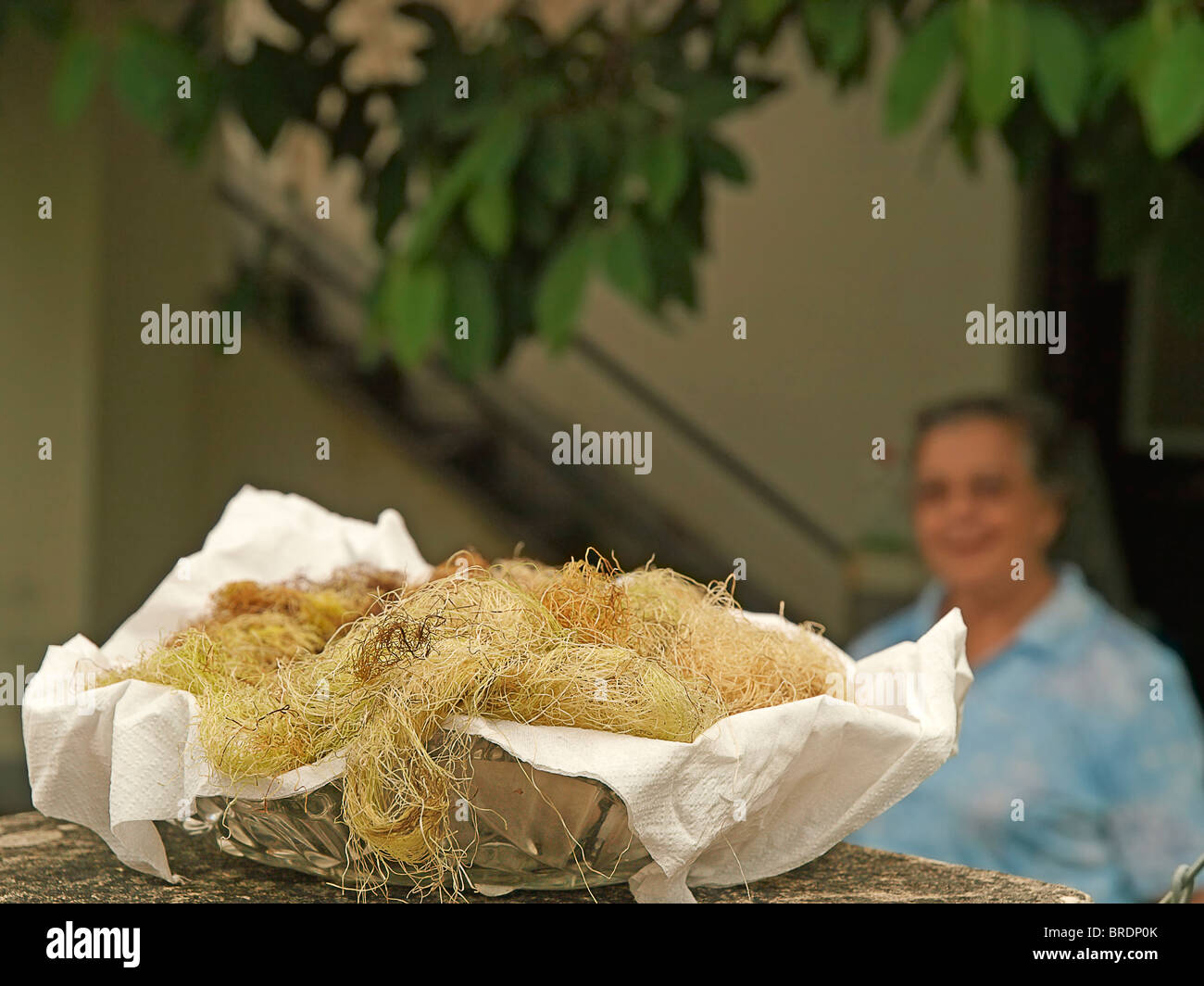 Drying corn craft Portuguese woman Madeira, Portugal travel Stock Photo ...