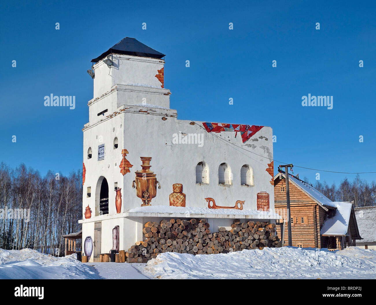 Outside construction demonstrating greatly enlarged in size traditional ...