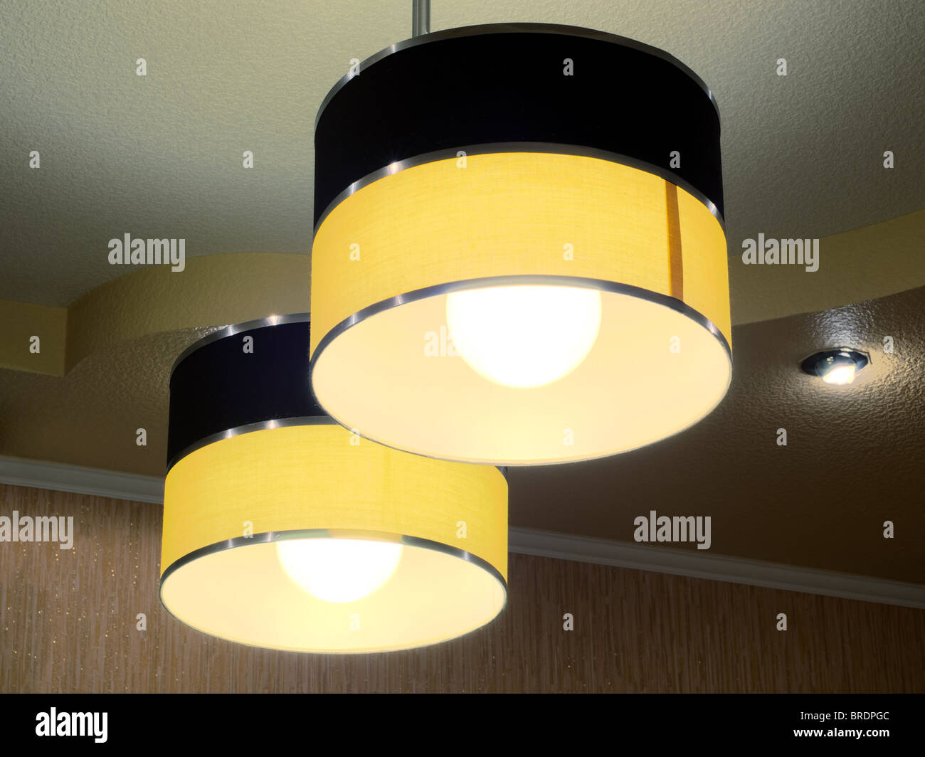 Two modern ceiling lights with energy saving bulbs Stock Photo - Alamy