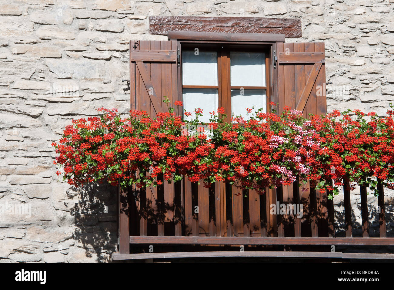 Balcony stone house flowers hi-res stock photography and images - Alamy