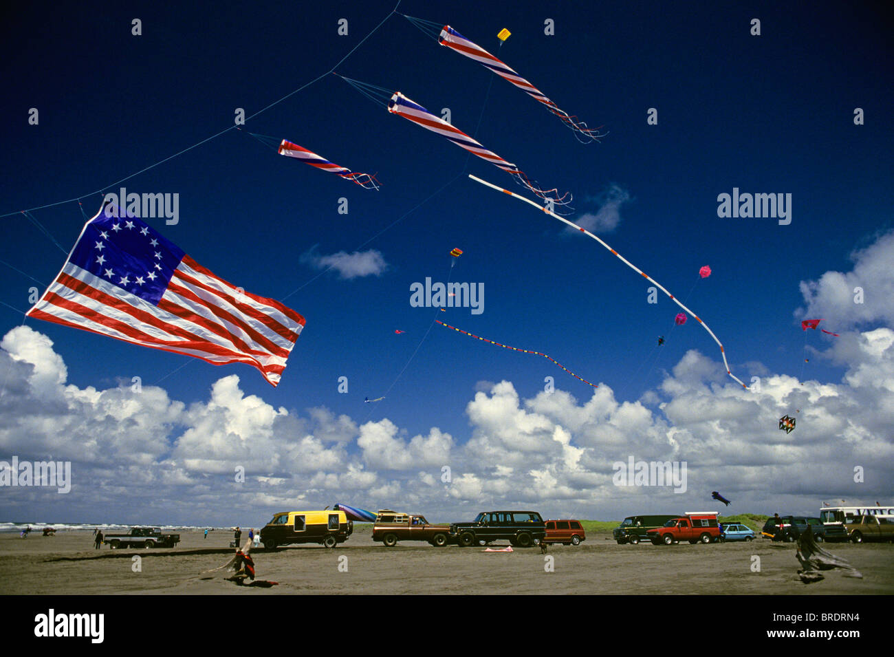 Retro image, American flag kites in blue sky at the International kite ...
