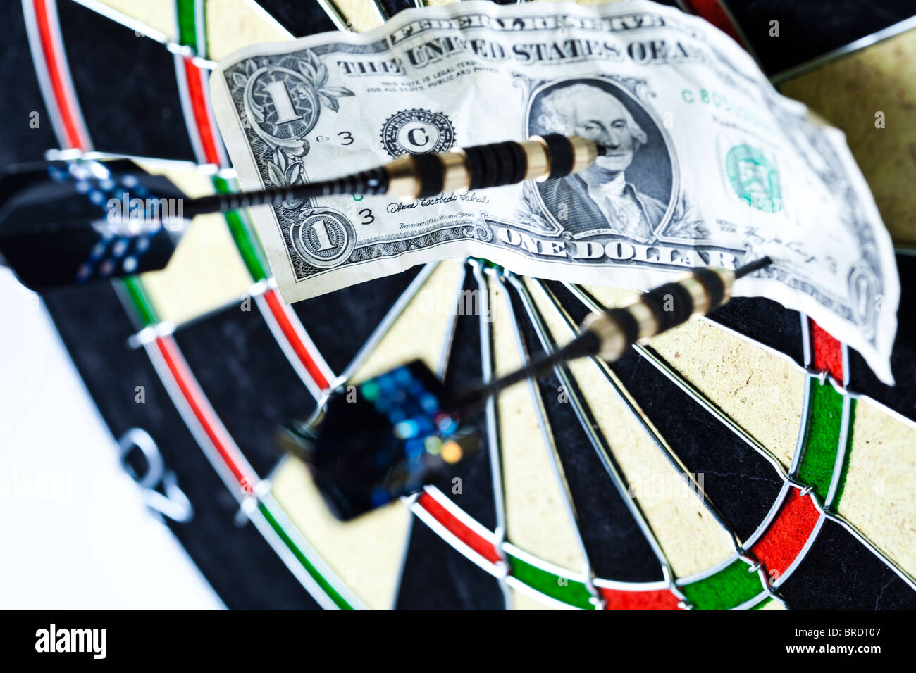 Target board with money Stock Photo - Alamy