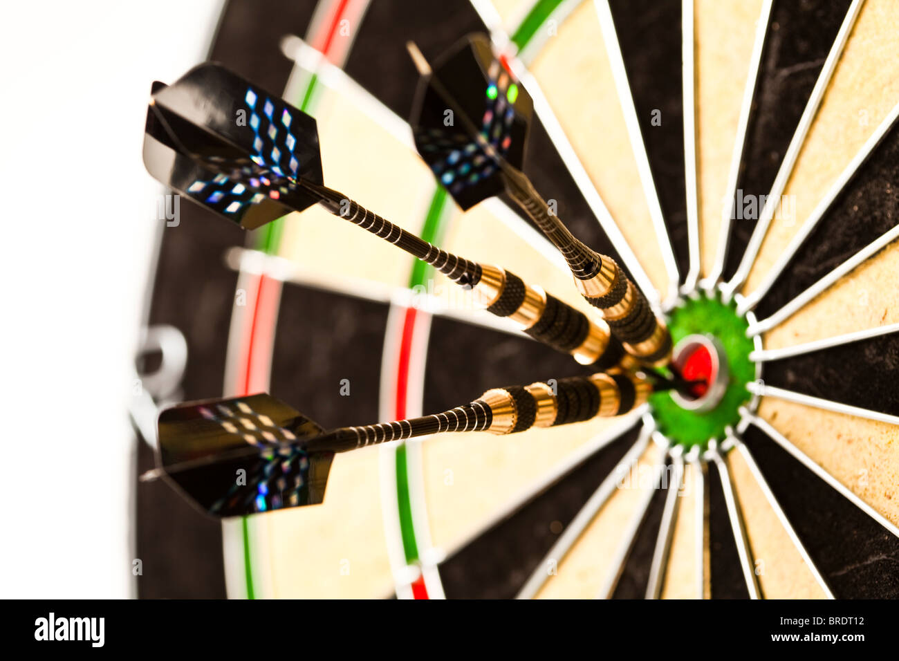 Three darts hit center target hi-res stock photography and images - Alamy