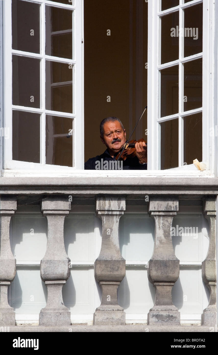 Classical violin practice by open window, Bruges, Belgium, Europe Stock ...