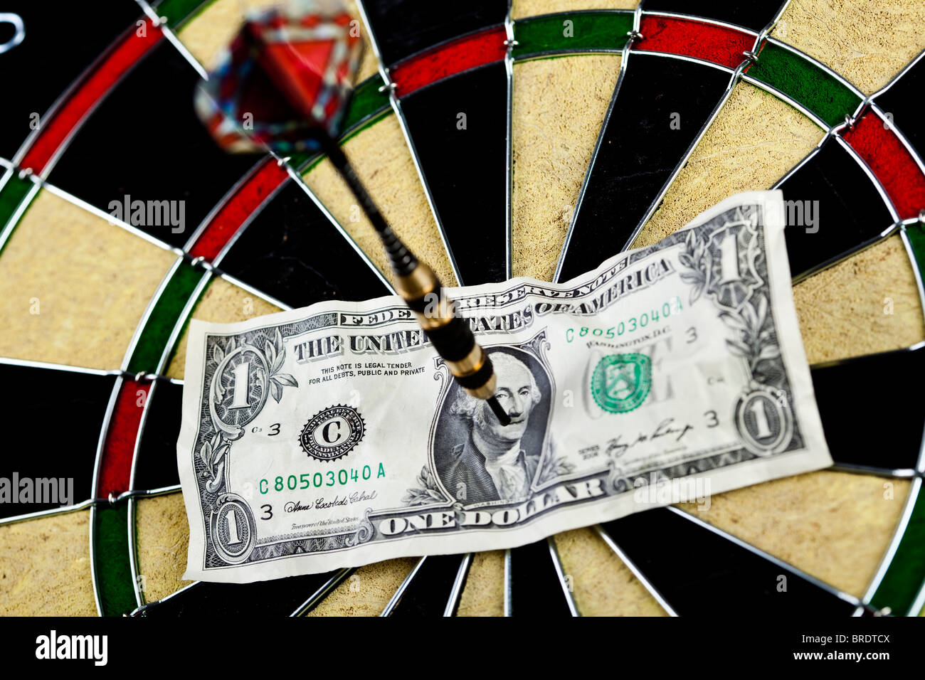 Target board with money Stock Photo - Alamy
