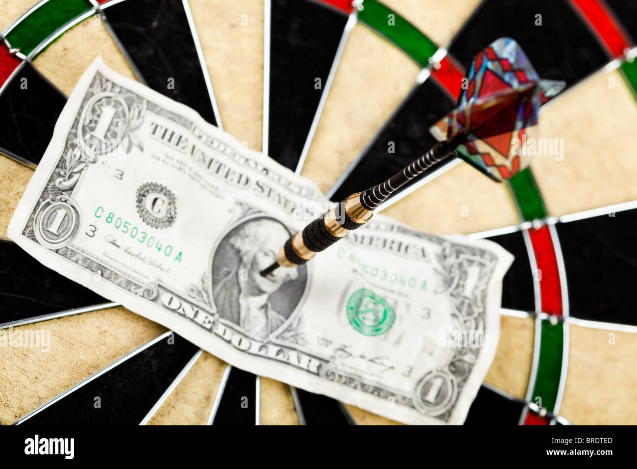 Target board with money Stock Photo - Alamy