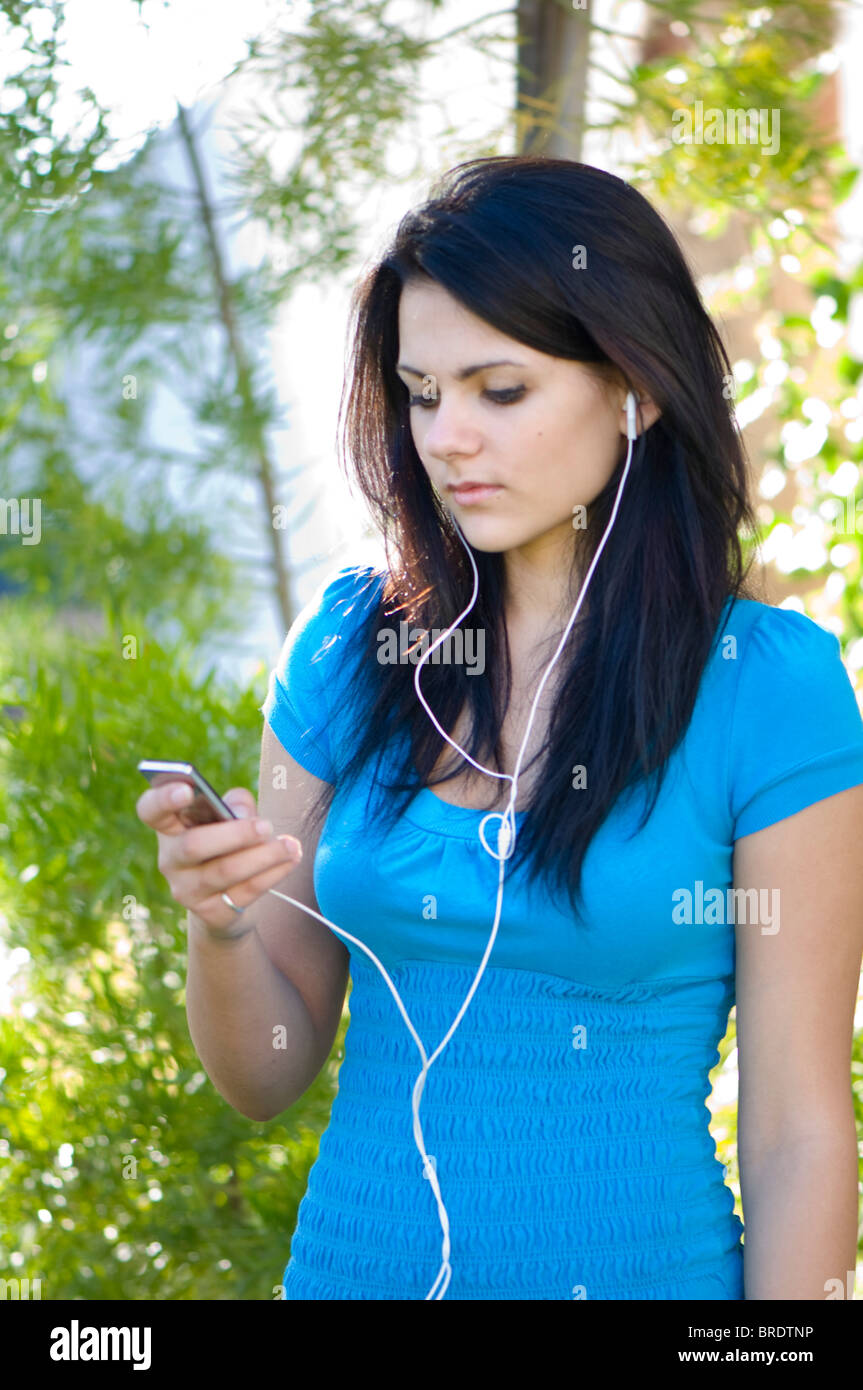 Beautiful Girl listening music Stock Photo - Alamy