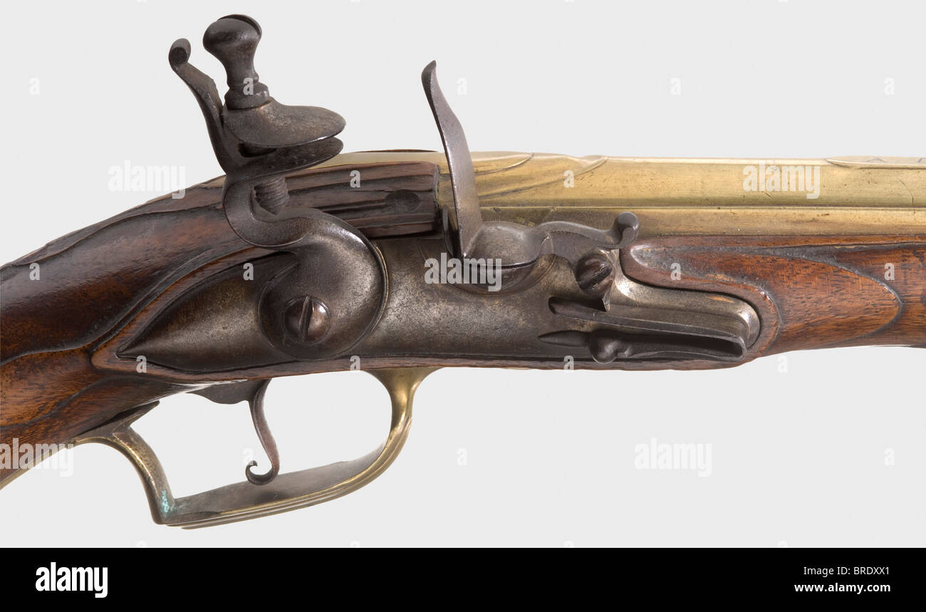 A pair of Italian flintlock pistols, circa 1780. Round brass barrels ...