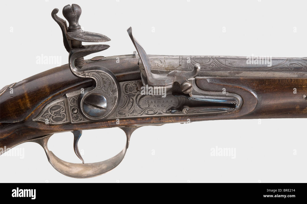 A pair of silver-mounted flintlock pistols, Mathias Karg, Hechingen ...