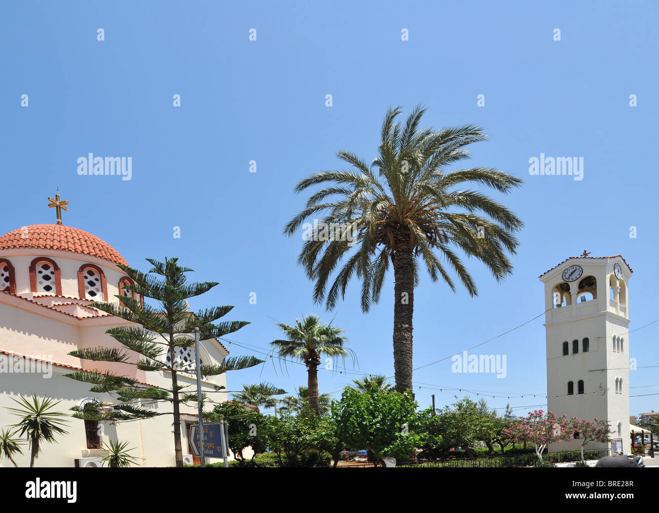 Elounda church and clock tower in Crete, Greece Stock Photo - Alamy