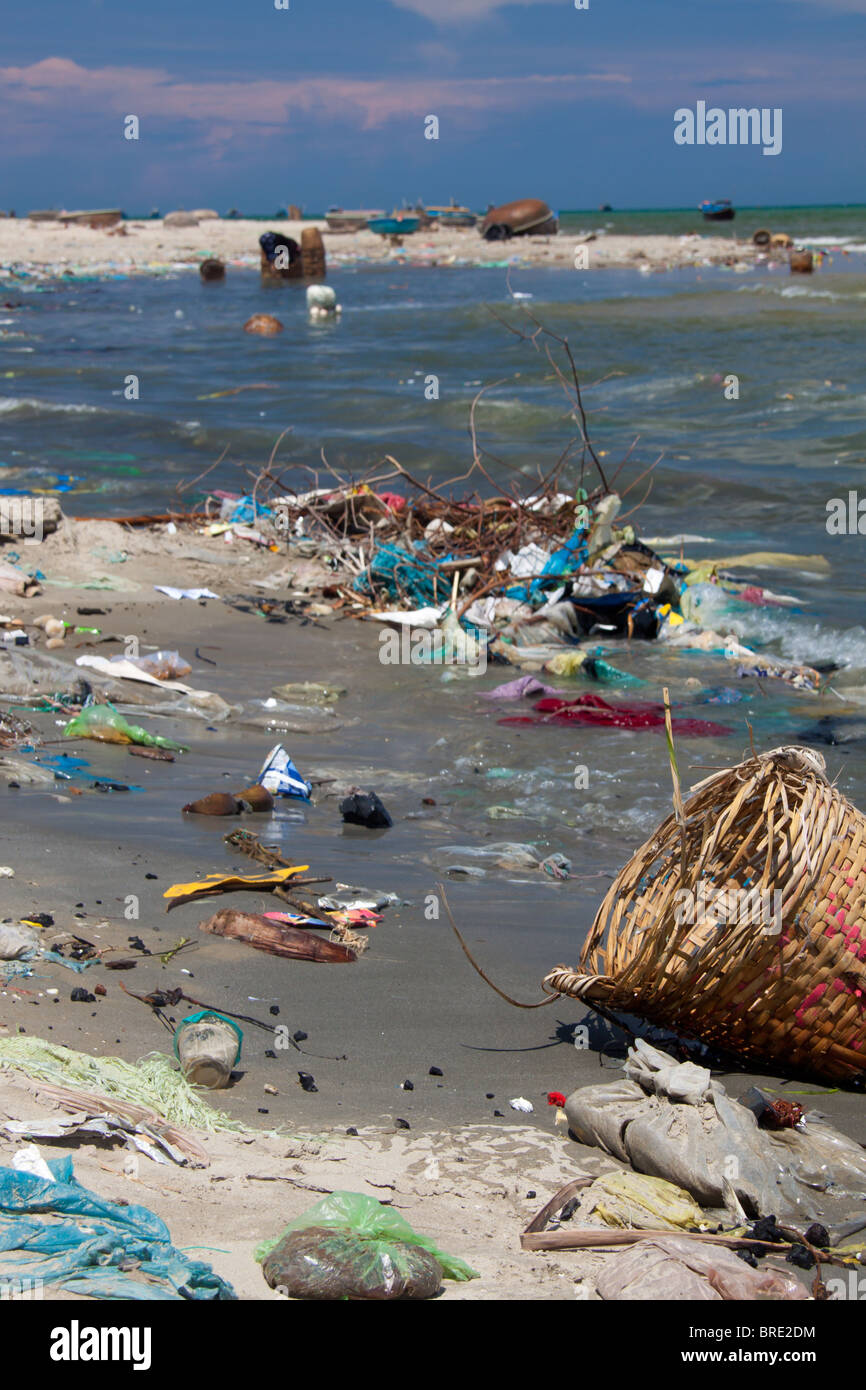 Various trash scattered along a coast Stock Photo - Alamy