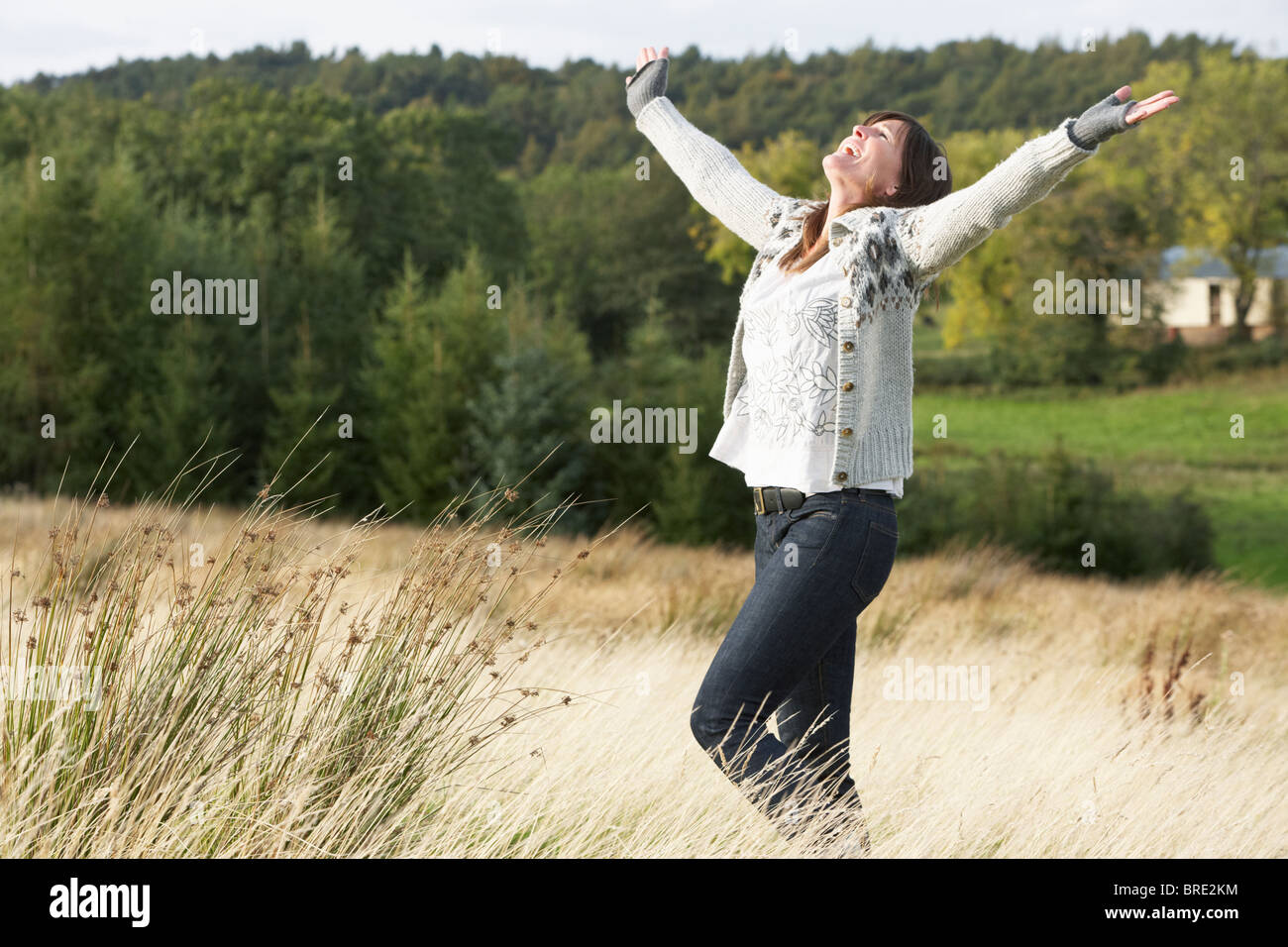 Young Woman Enjoying Freedom Outdoors in Autumn Landscape Stock Photo ...