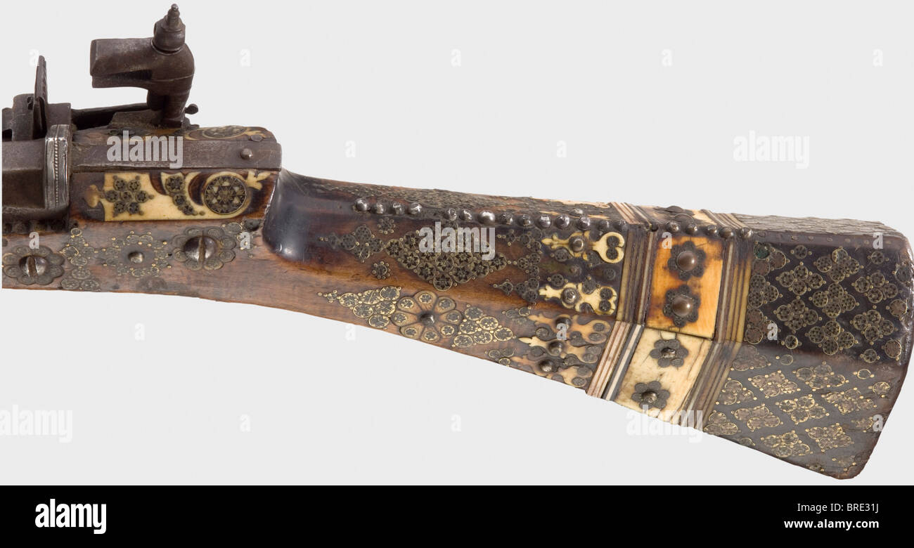 An Ottoman miquelet lock rifle, 18th century Octagonal barrel with ...