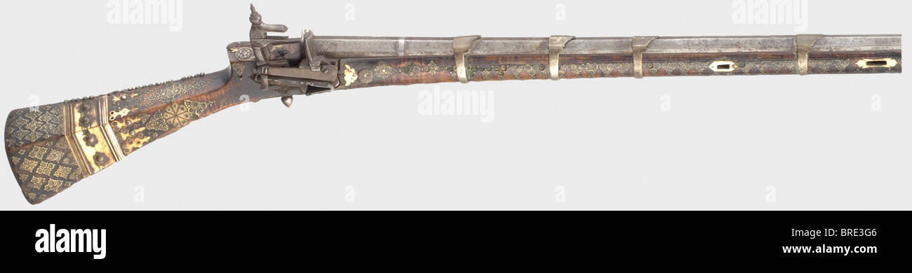 An Ottoman miquelet lock rifle, 18th century Octagonal barrel with ...