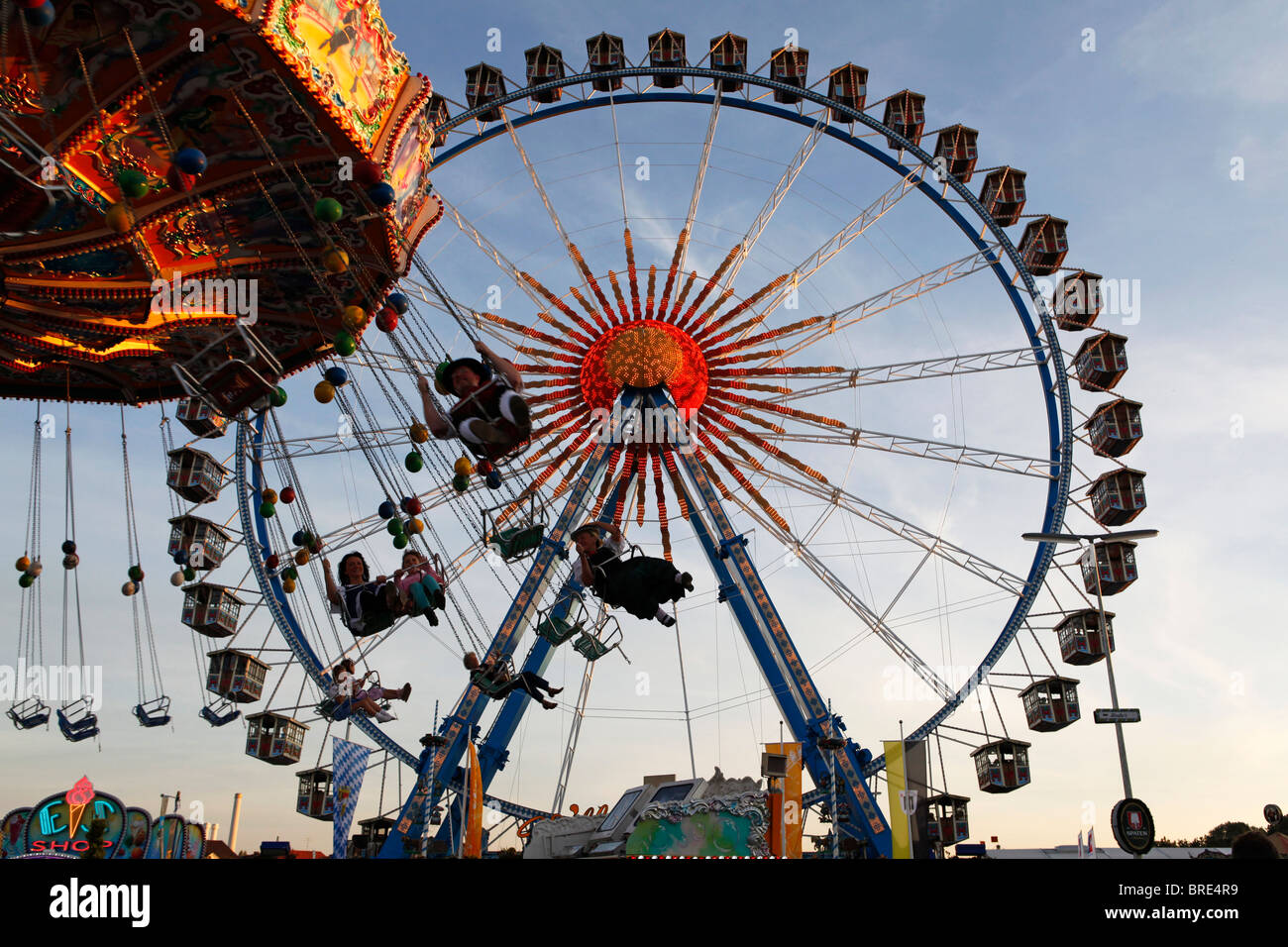 People swing on a carousel at the 2010 Munich Oktoberfest Stock Photo ...