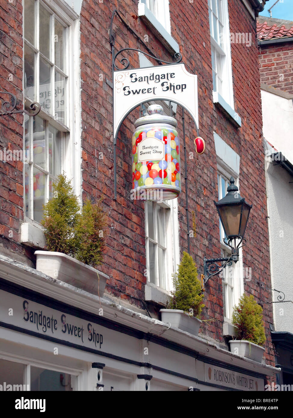 An old established sweet shop displays a unusual sign outside the ...