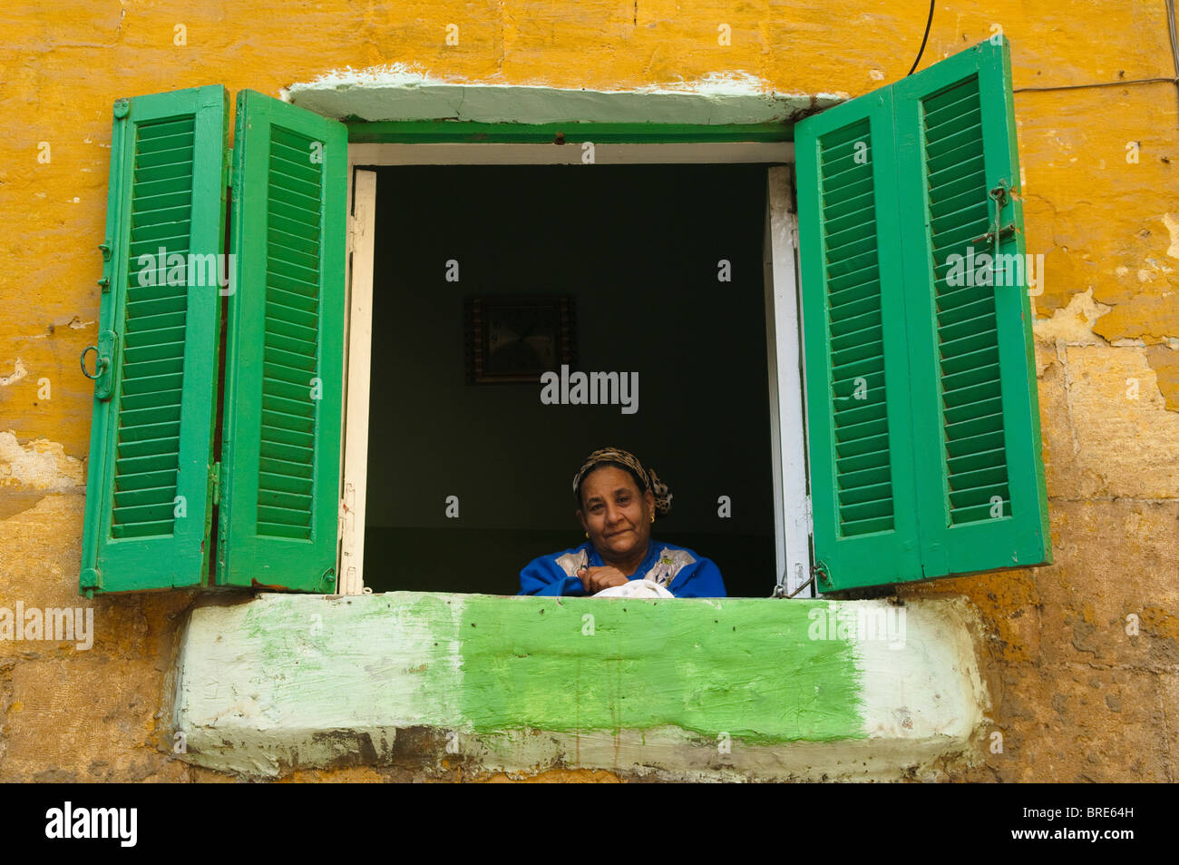 woman in the window in Cairo Egypt Stock Photo - Alamy