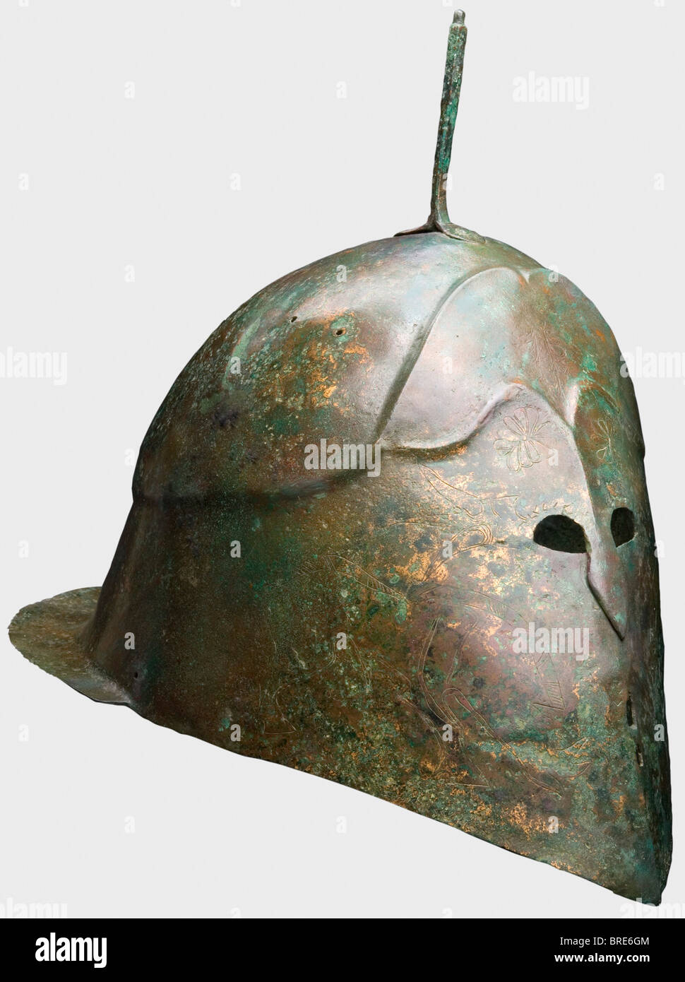 An Apulian-Corinthian helmet, 6th/5th century B.C. Tall bronze skull ...