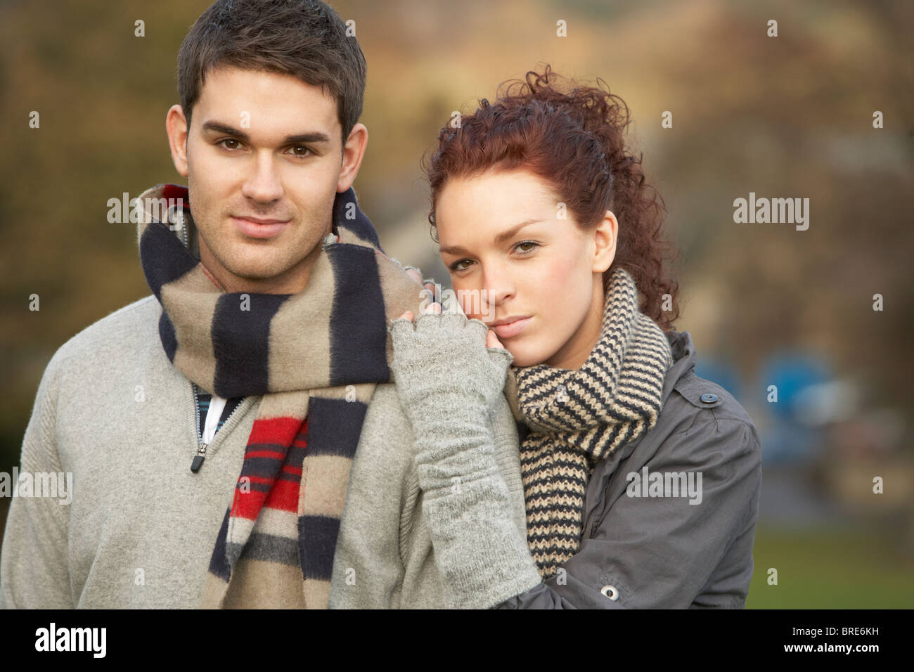 Romantic Teenage Couple In Autumn Landscape Stock Photo - Alamy