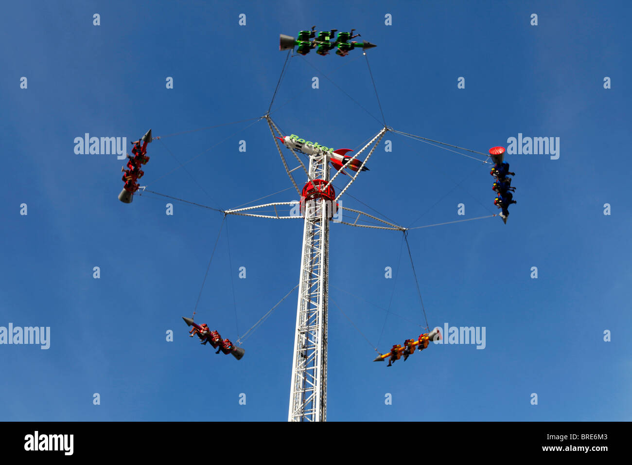 People ride The Rocket carousel at the 2010 Munich Oktoberfest Stock ...