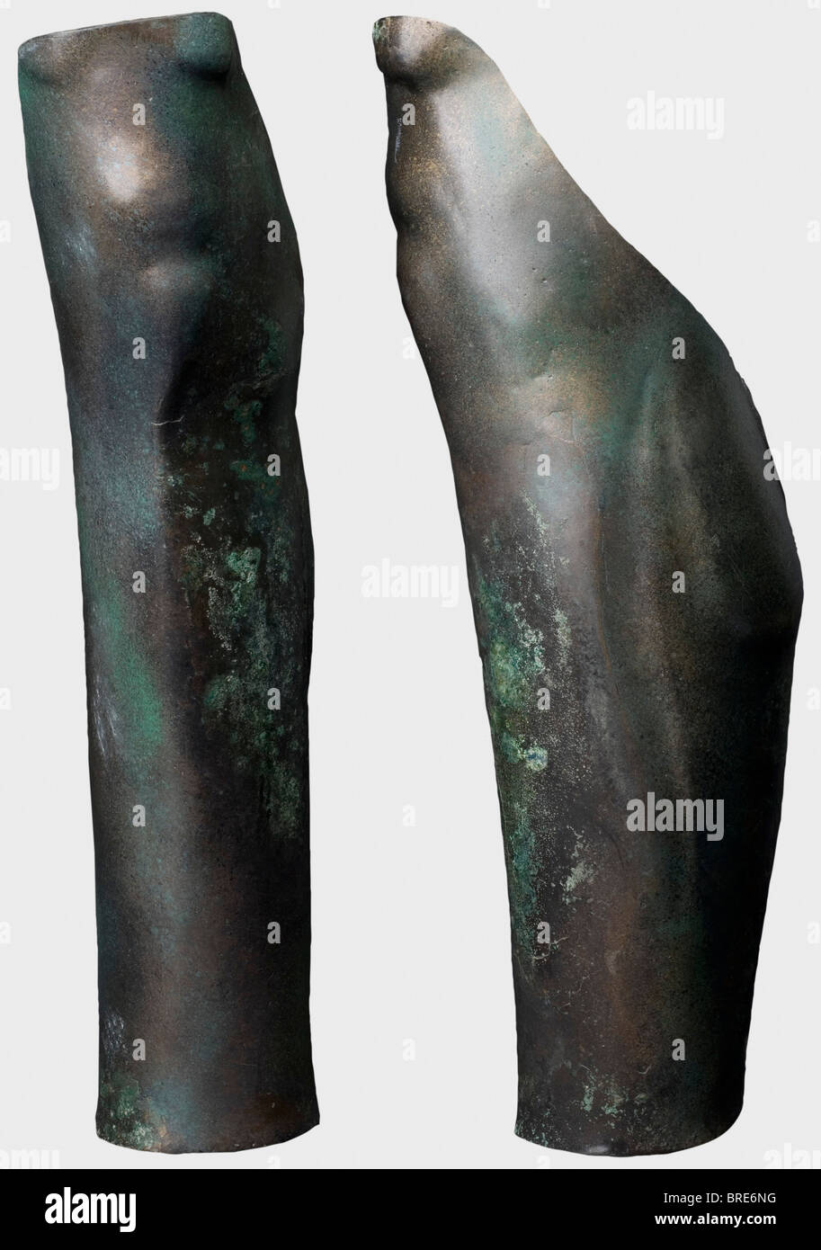 Two Greek greaves, 5th/4th century B.C. Tubular, bronze greaves moulded ...