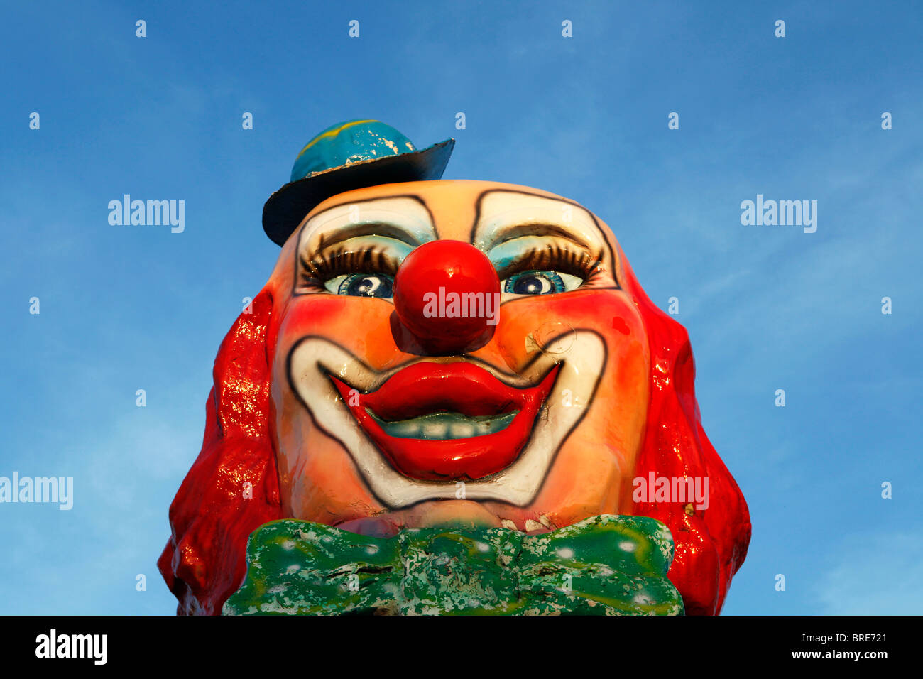 A clown's face under a blue sky Stock Photo - Alamy