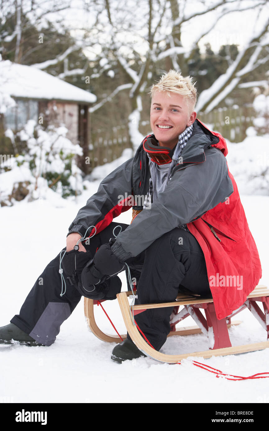 Teenage Boy With Sledge Stock Photo - Alamy