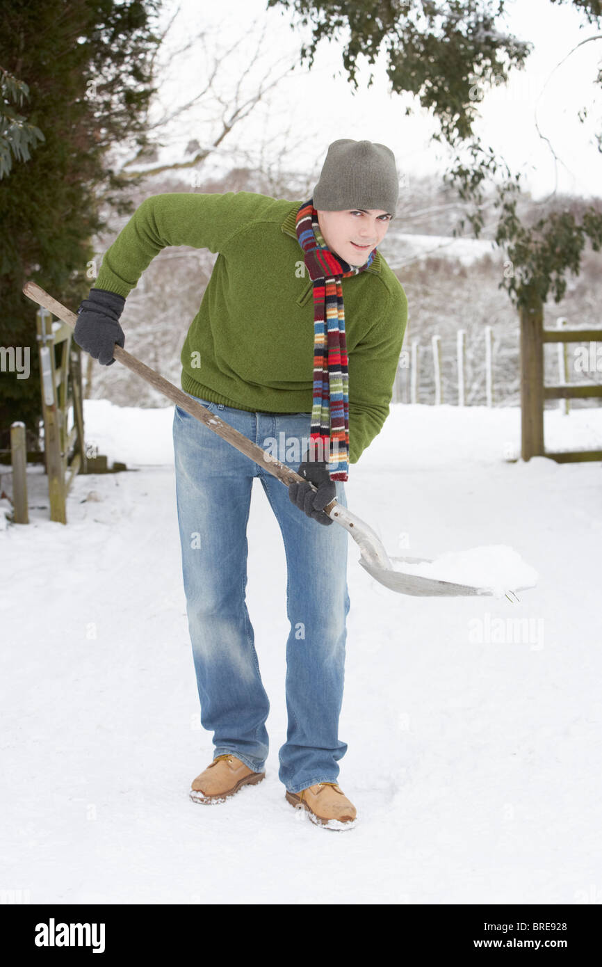 Young Man Clearing Snow From Drive Stock Photo - Alamy Young Man Clearing Snow From Drive Stock Photo - Alamy