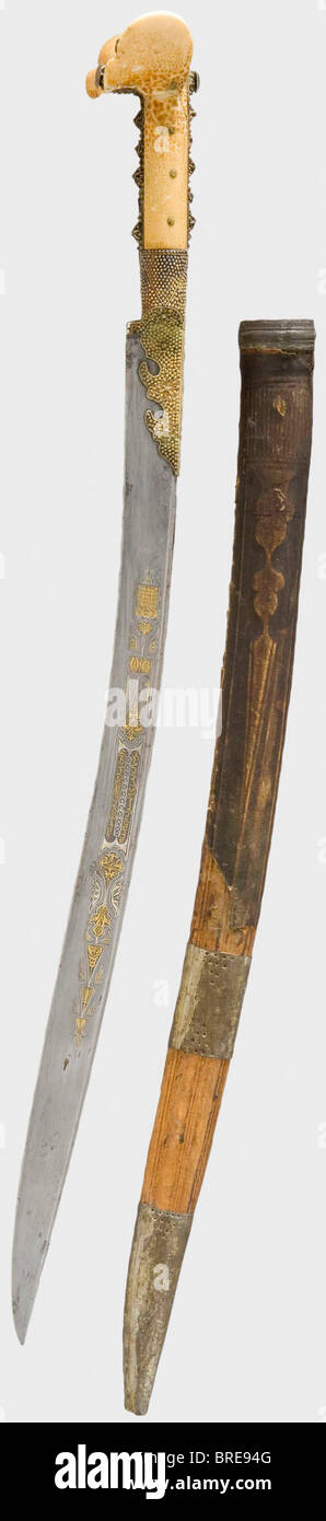 A silver-mounted Ottoman yatagan, dated 1812 Typically curved blade ...